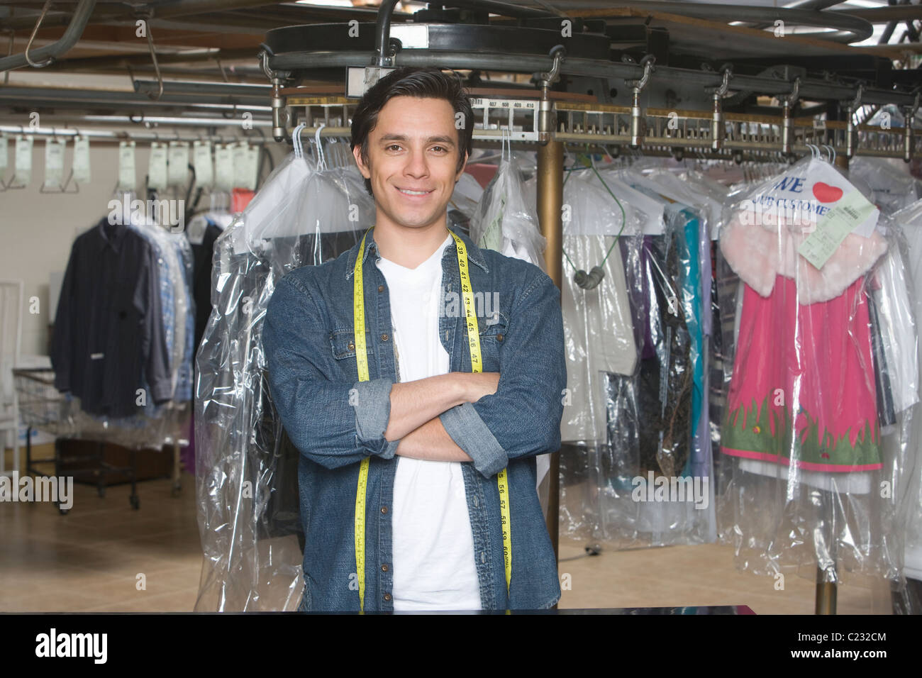 Man working in laundrette hi-res stock photography and images - Alamy
