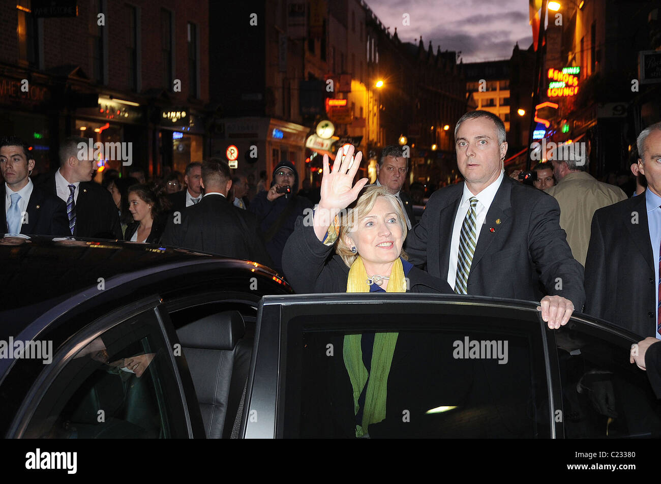 U.S. Secretary of State Hillary Clinton walks along Grafton Street with ...