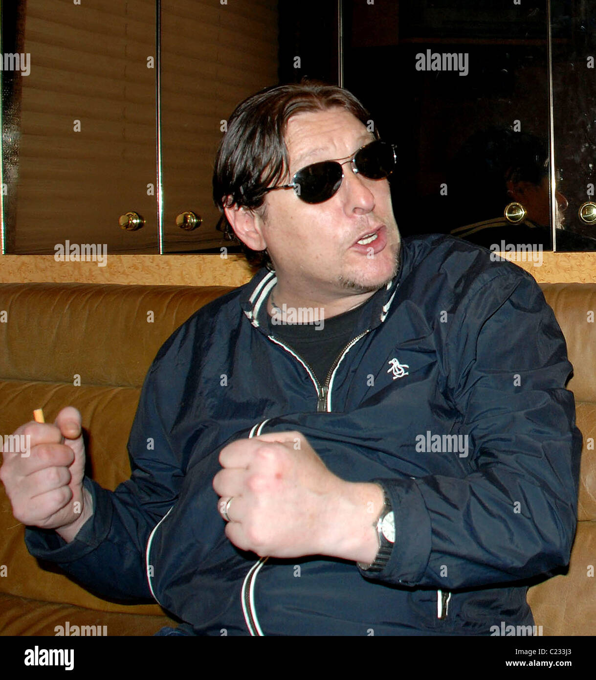 Shaun Ryder from the Happy Mondays on his tour bus after performing at ...