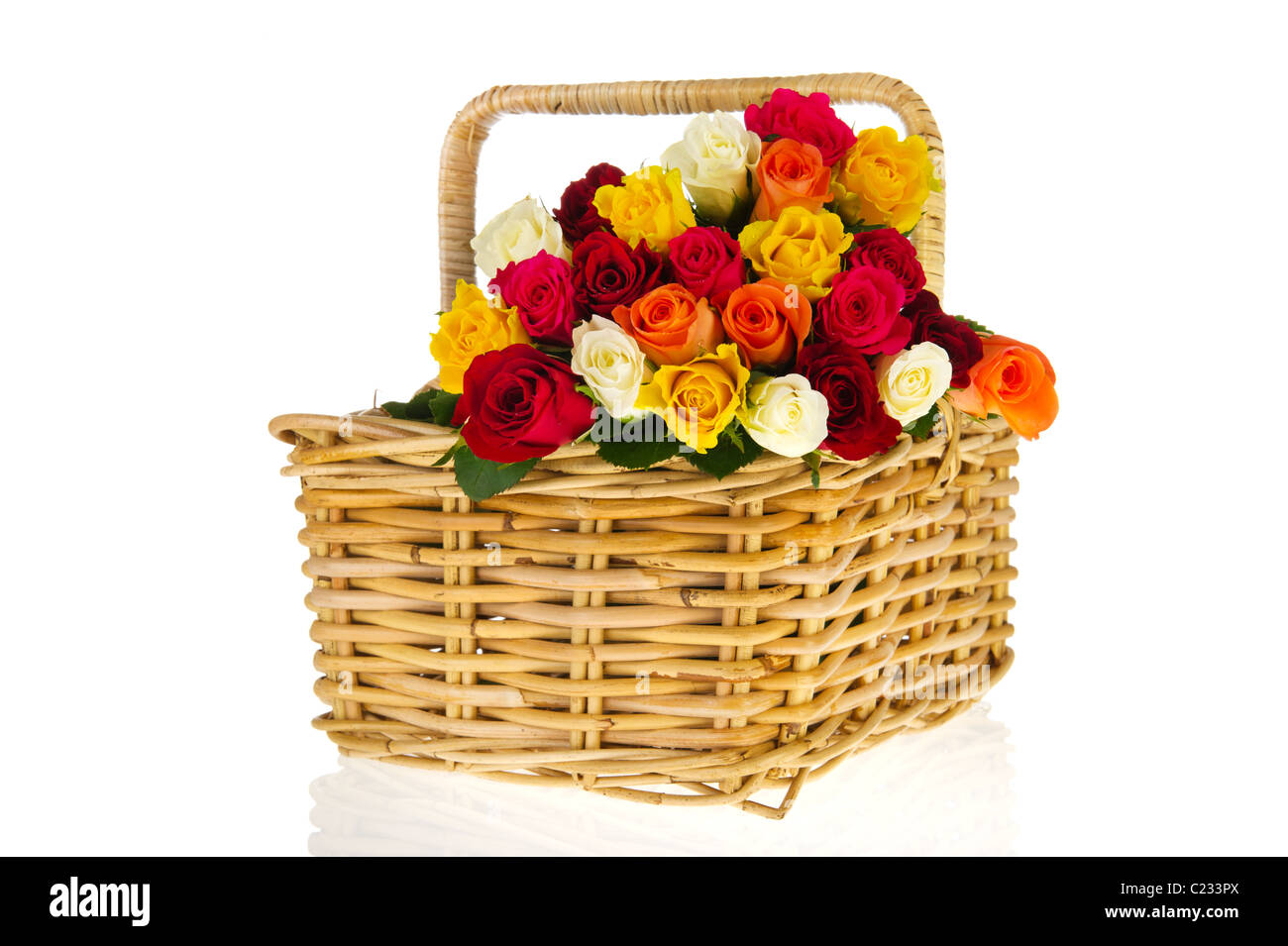 Colorful bouquet roses in basket isolated on white background Stock ...