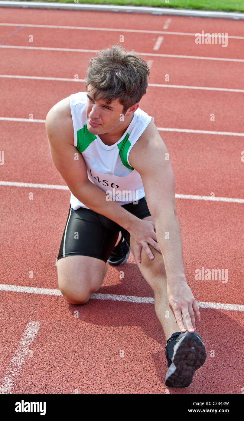 Sprinter stretching hi-res stock photography and images - Alamy
