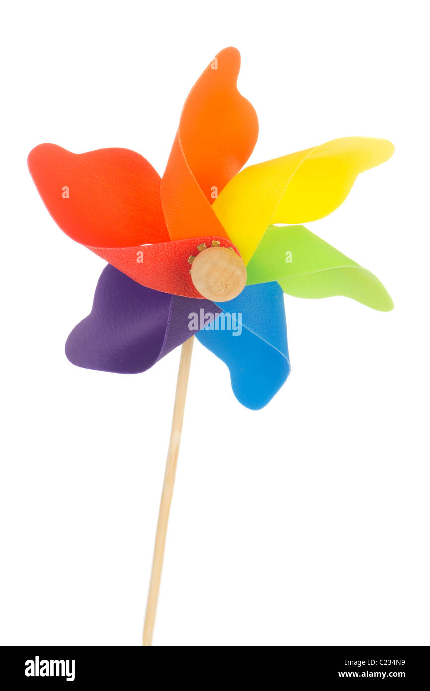 Colorful toy wind mill isolated over white Stock Photo - Alamy