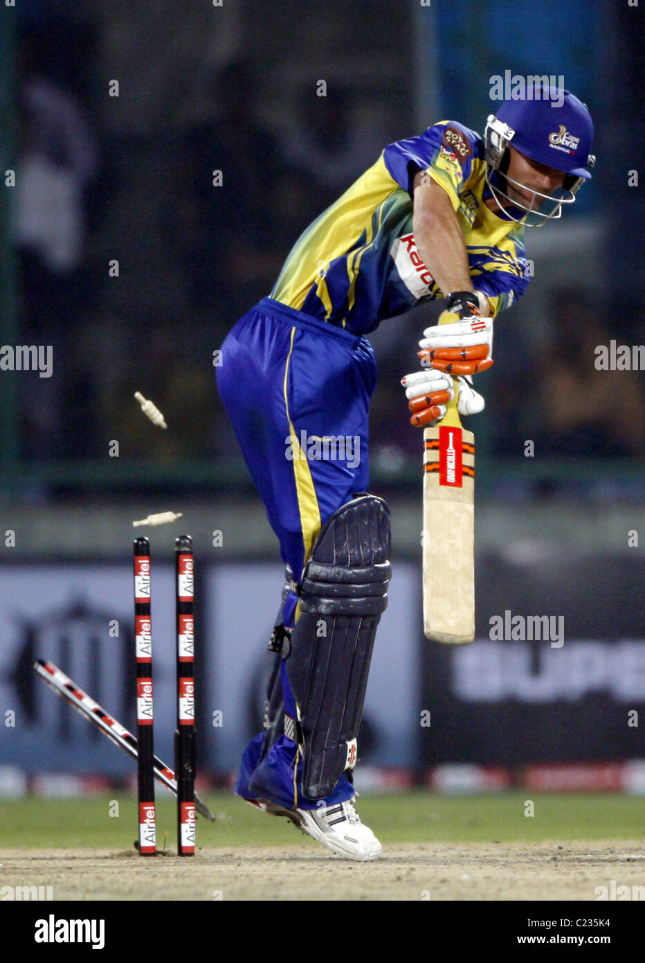 Andrew Puttick of the Cape Cobras is bowled by Dirk Nannes (not ...