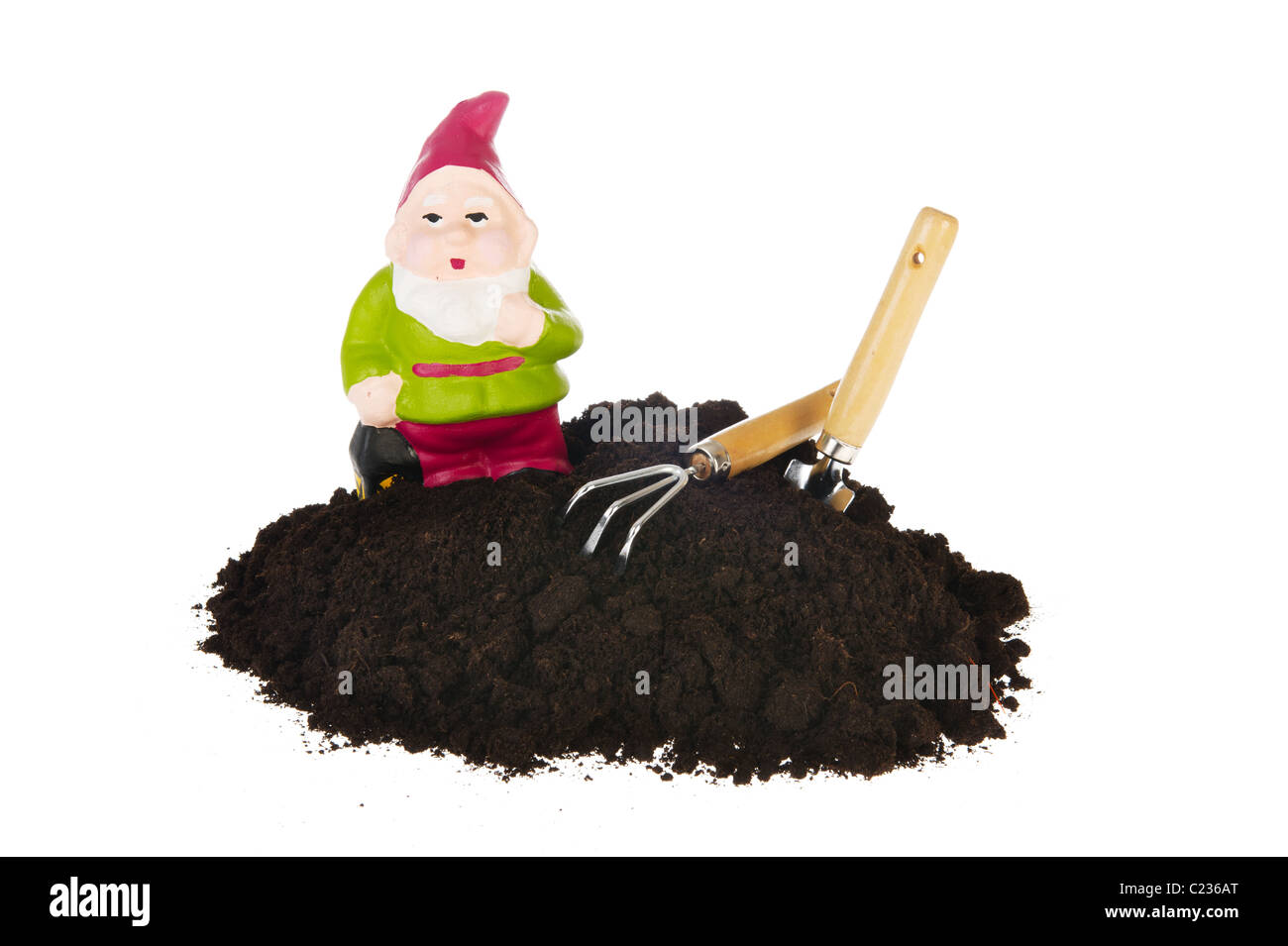 Gardening with gnome and garden tools isolated over white background ...