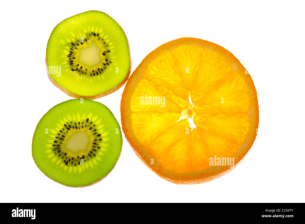slices tropical fruit as oranges and kiwi on white background Stock ...