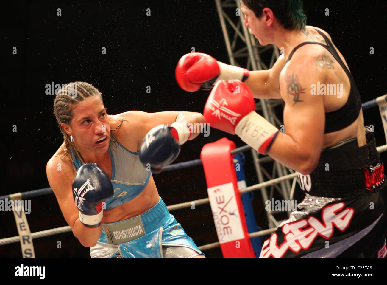 Myriam Lamare of France (blue) v Ann Marie Saccurato of the USA (black ...