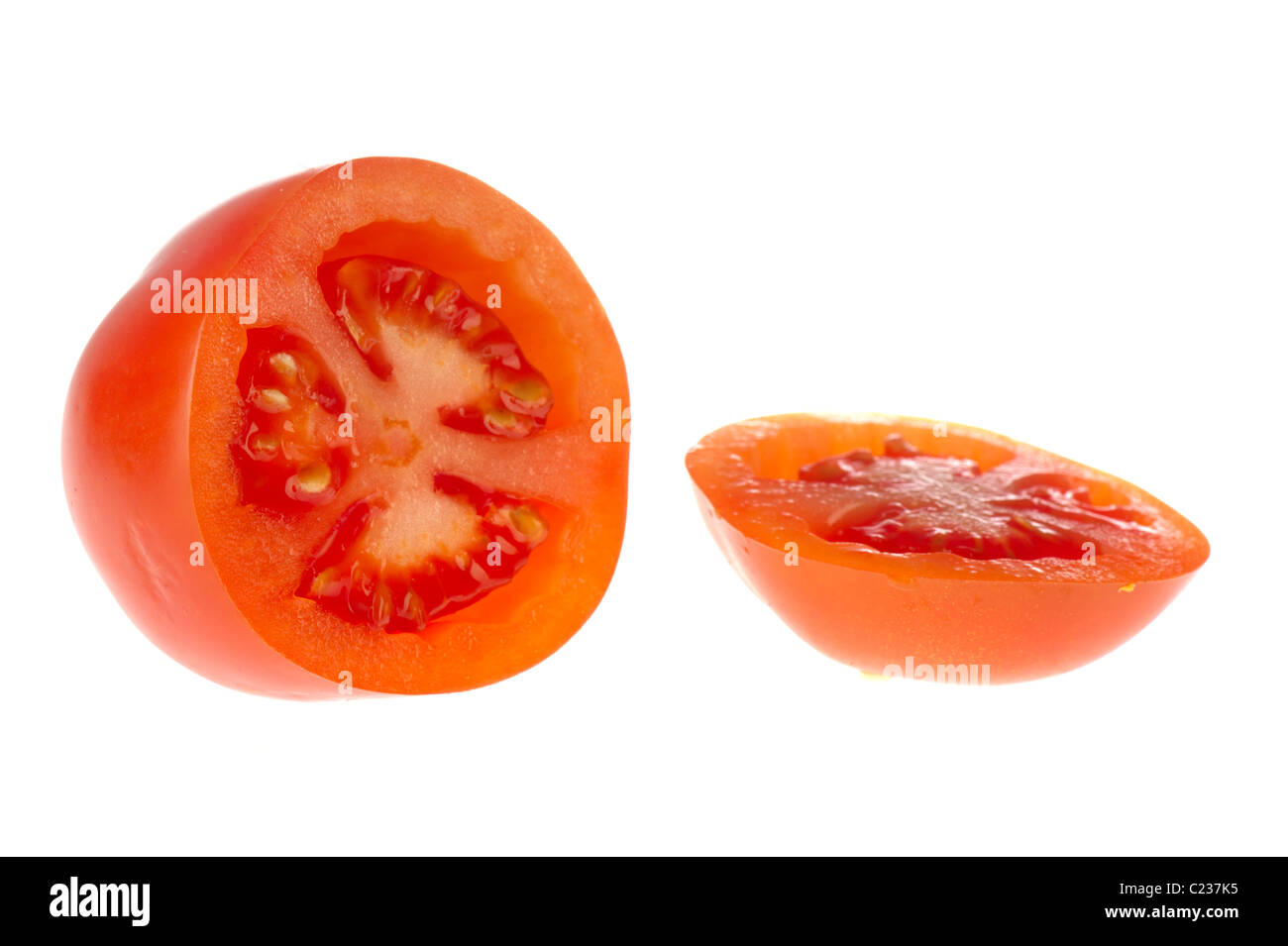 cut fresh tomato isolated on whote background Stock Photo - Alamy