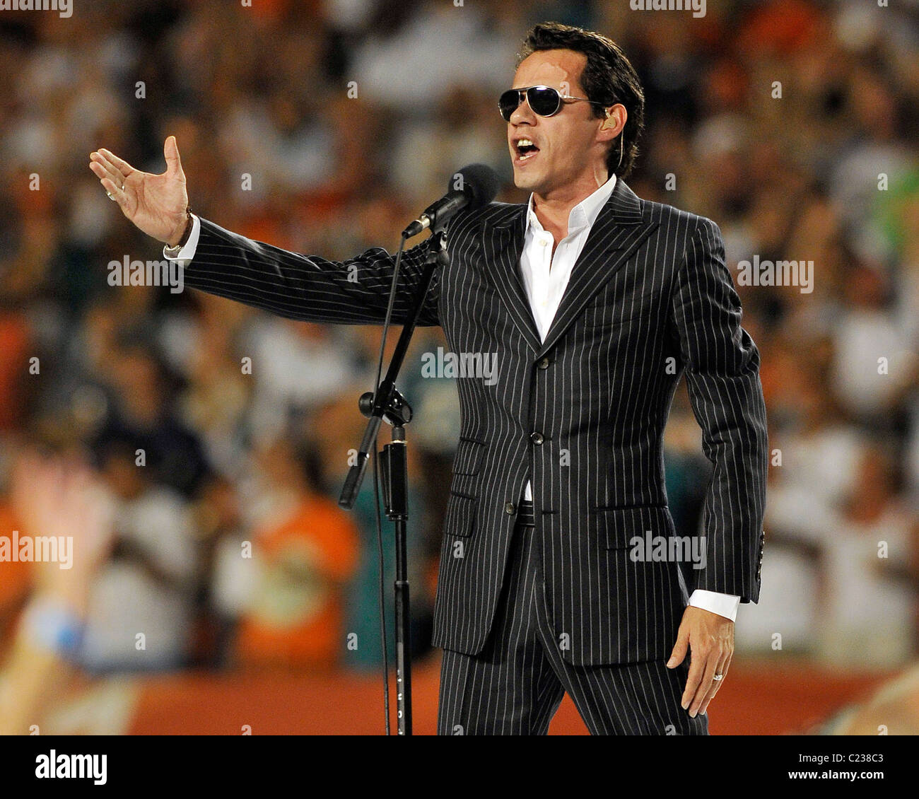 Marc Anthony performing the National Anthem prior to the Miami Dolphins ...