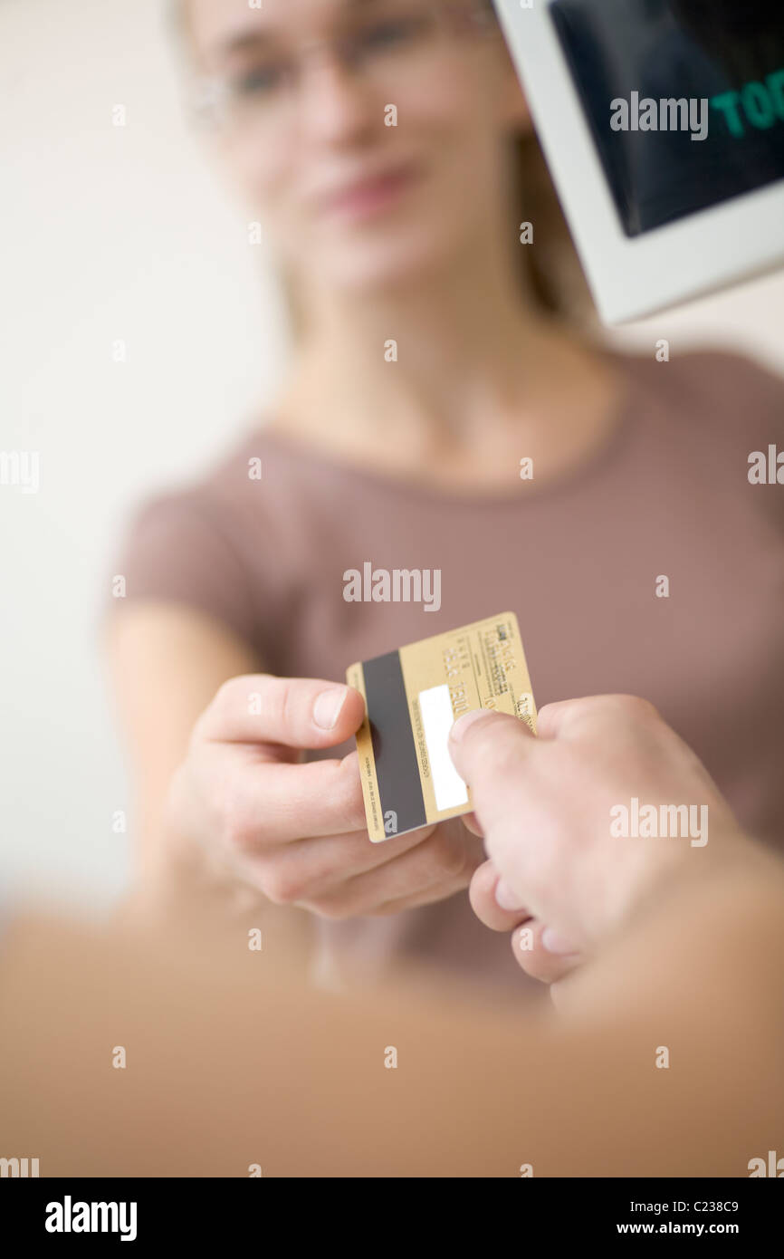 Handing Over A Credit Card High Resolution Stock Photography and Images ...