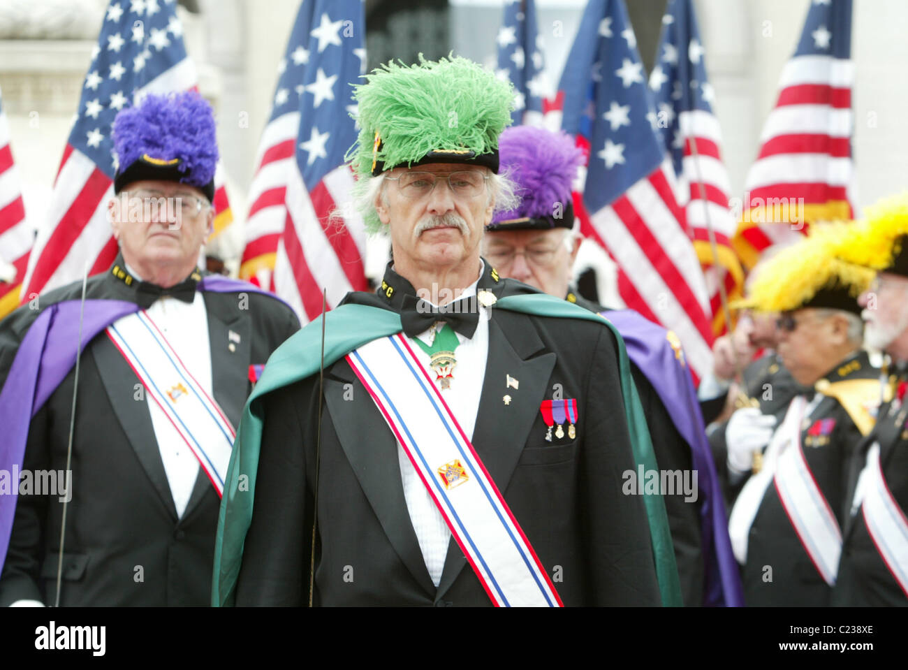 The Knights of Columbus stand in front of the Christopher Columbus ...