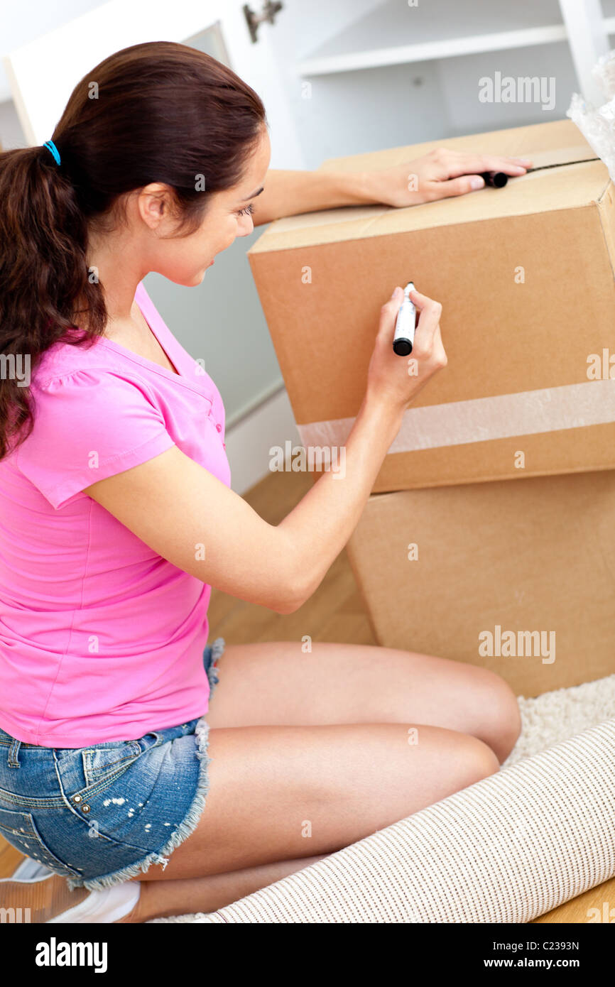 Joyful woman packing cardboard hi-res stock photography and images - Alamy