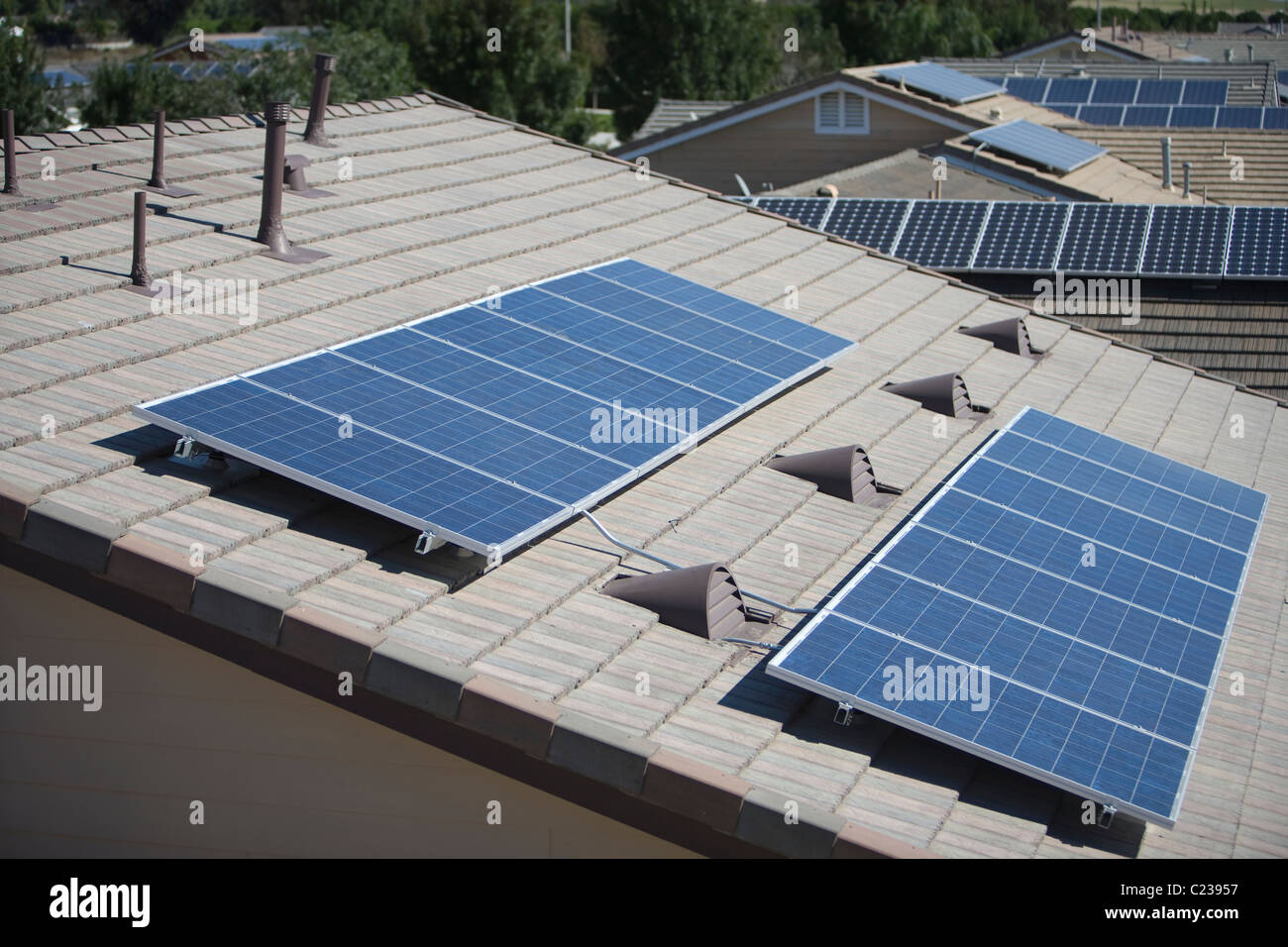 Roof tops with some solar panelling on Stock Photo - Alamy