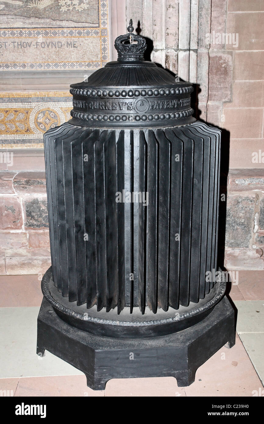 A Victorian 'space' heater often used for heating churches and other ...