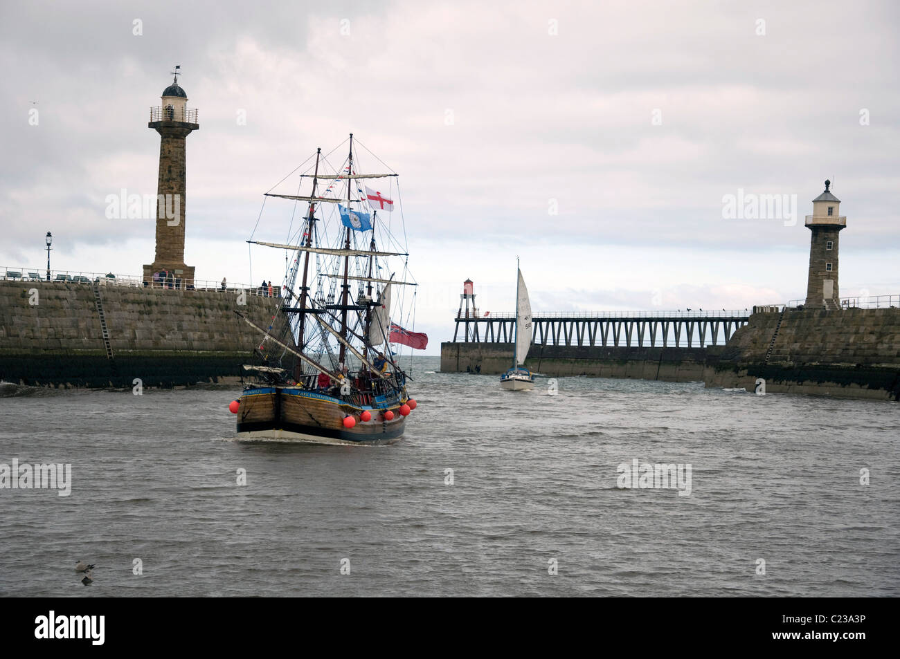 "Pirate ship" entering the harbour at Whitby, North Yorkshire, England ...