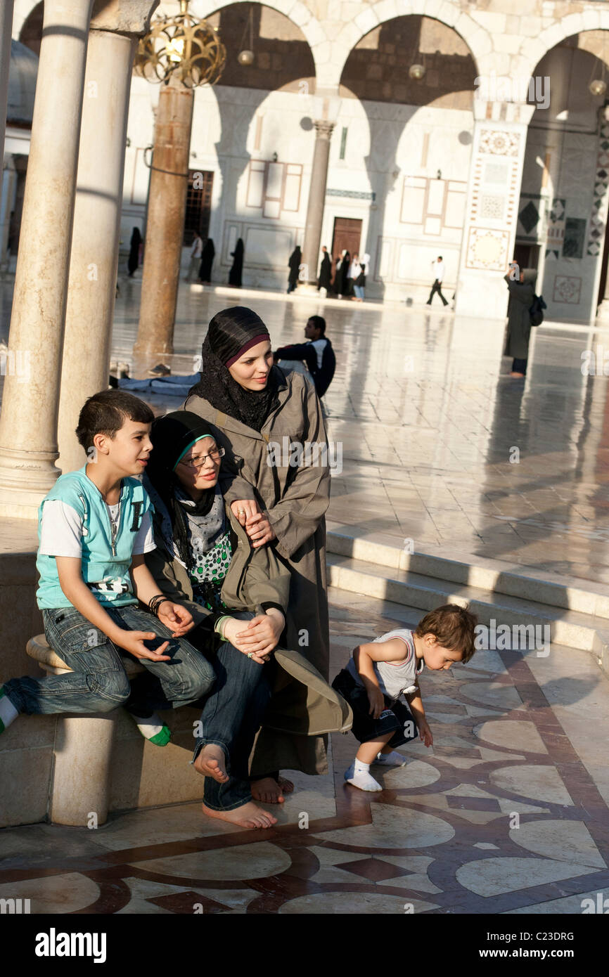 Arab family taking photos in the courtyard of Umayyad Mosque, Great ...