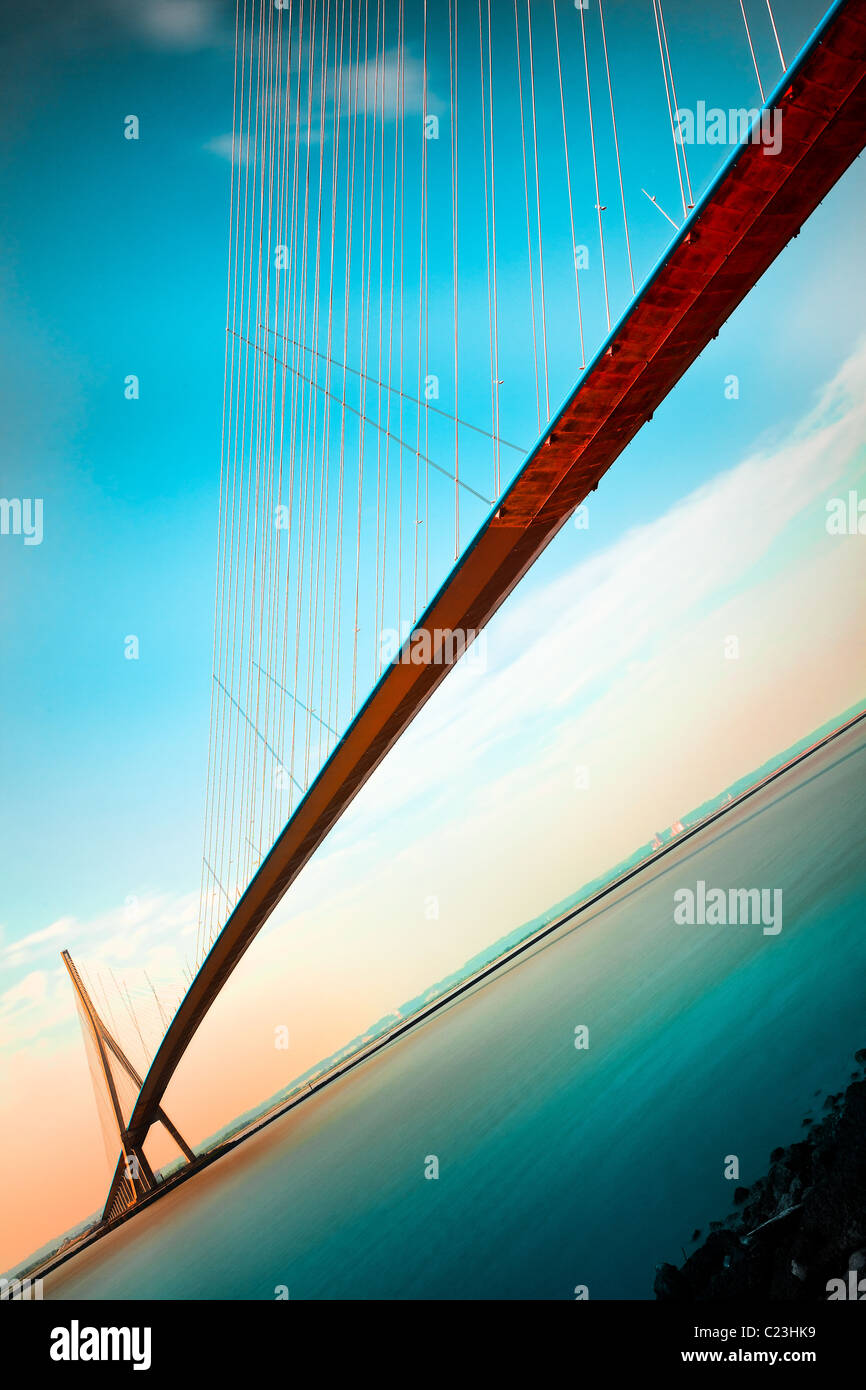 A very long bridge spans over a river Stock Photo - Alamy