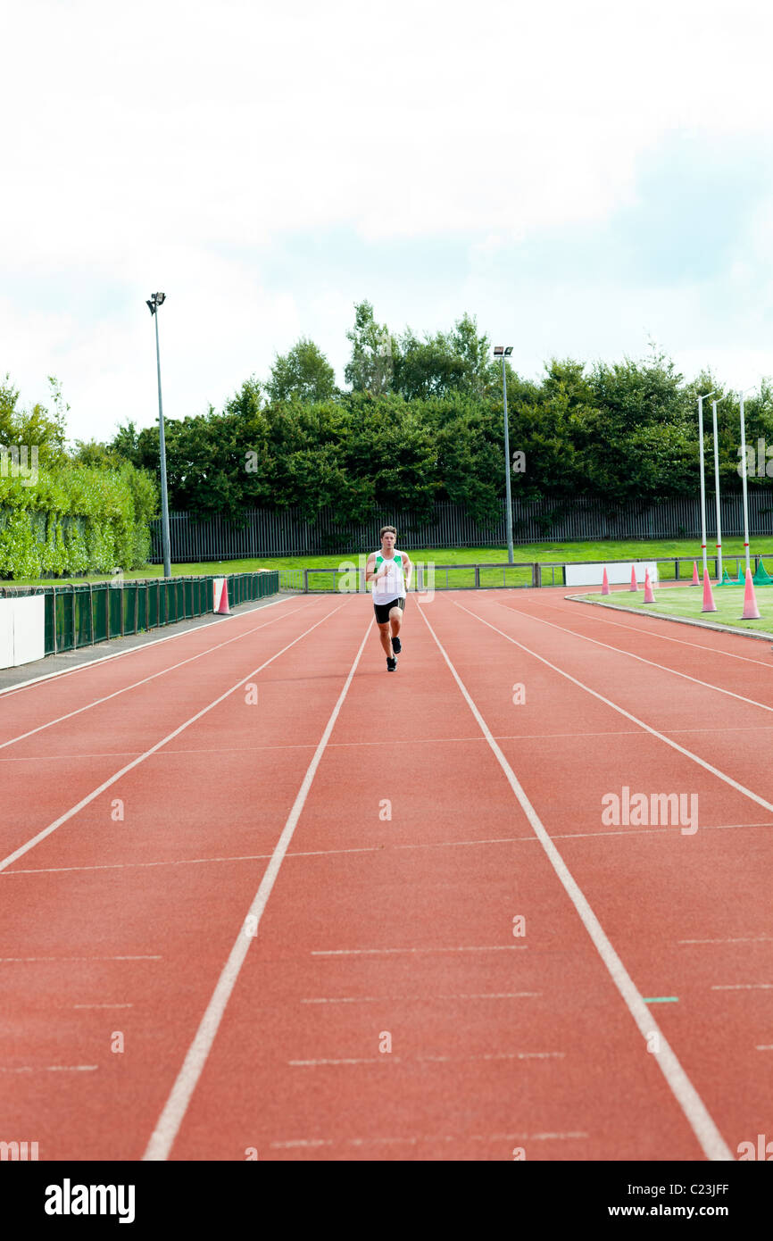 Athletic male sprinter training Stock Photo - Alamy