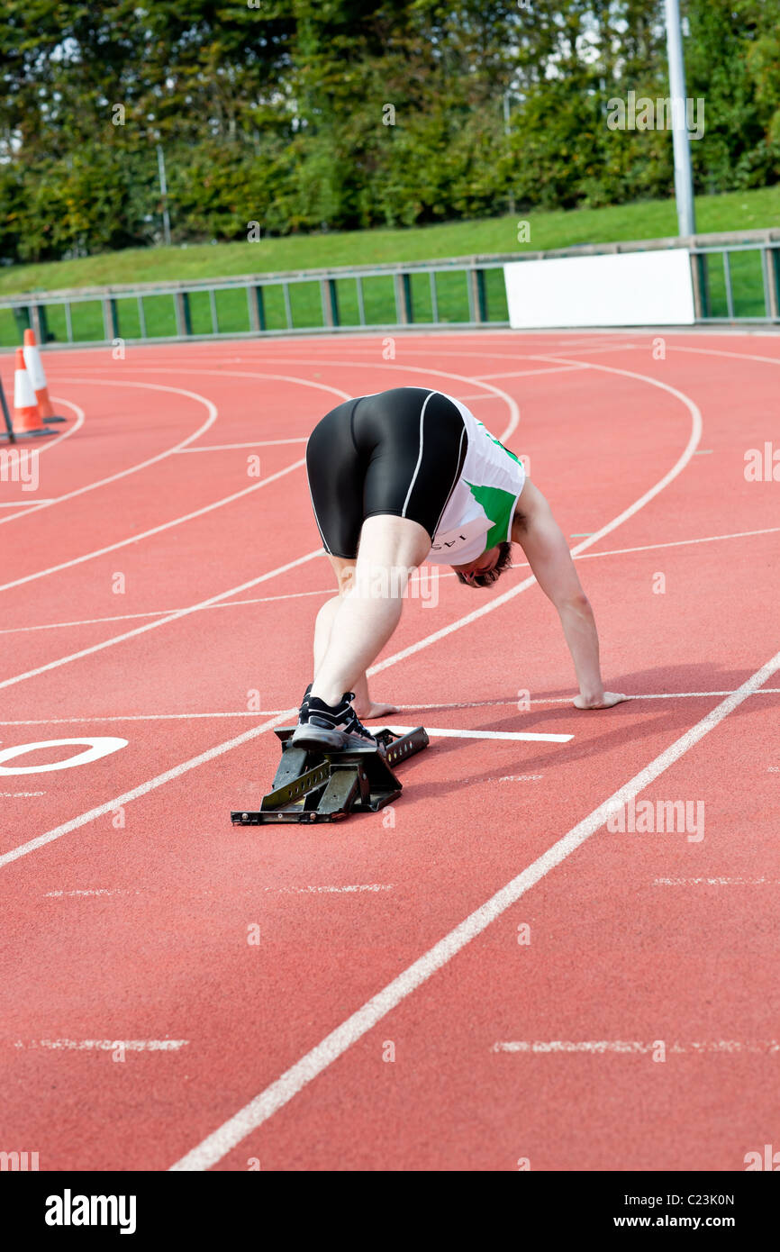 Runner crouching starting block hi-res stock photography and images - Alamy