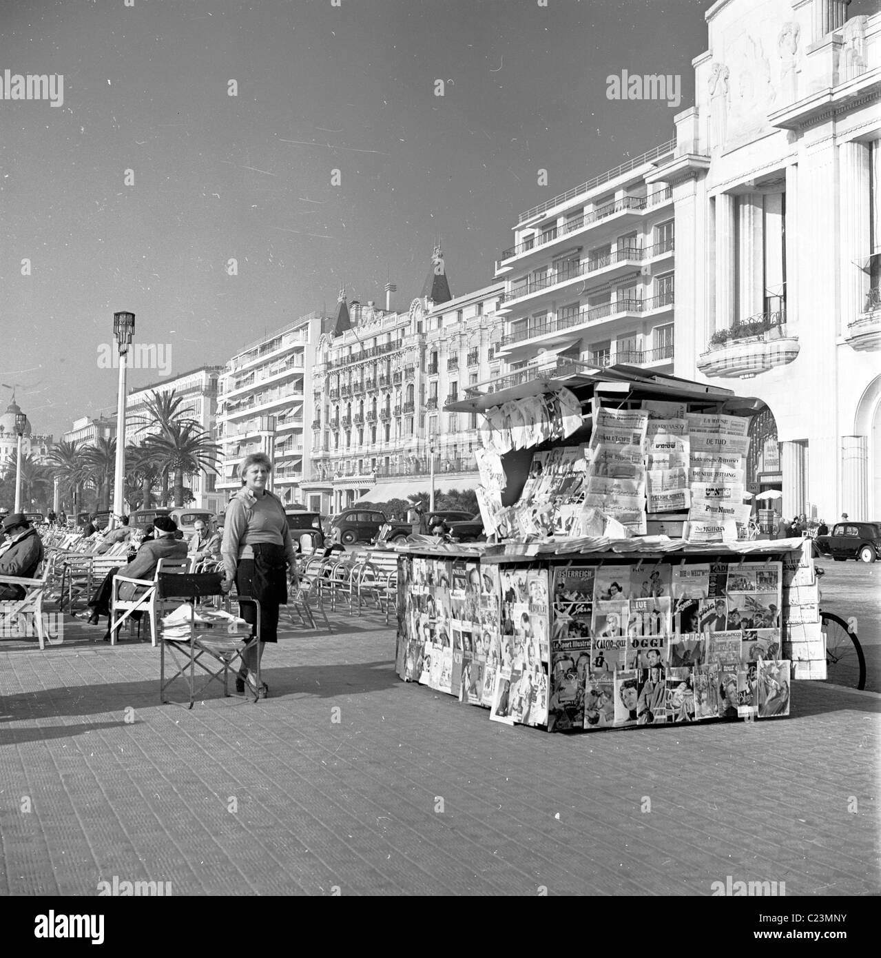 1950s. France. Newspaper and magazine stall on the promenade at Cannes ...