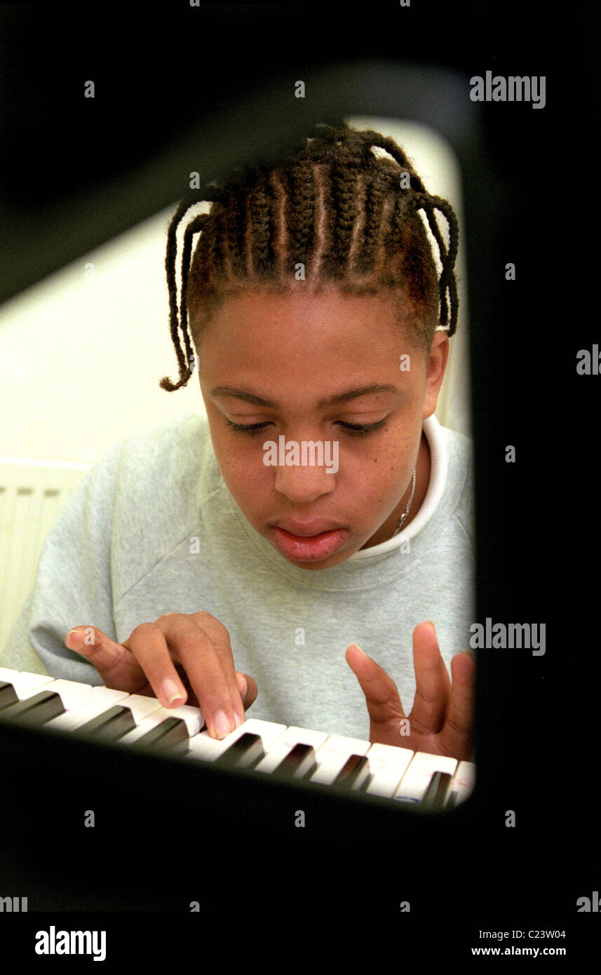 Child piano lesson hi-res stock photography and images - Alamy