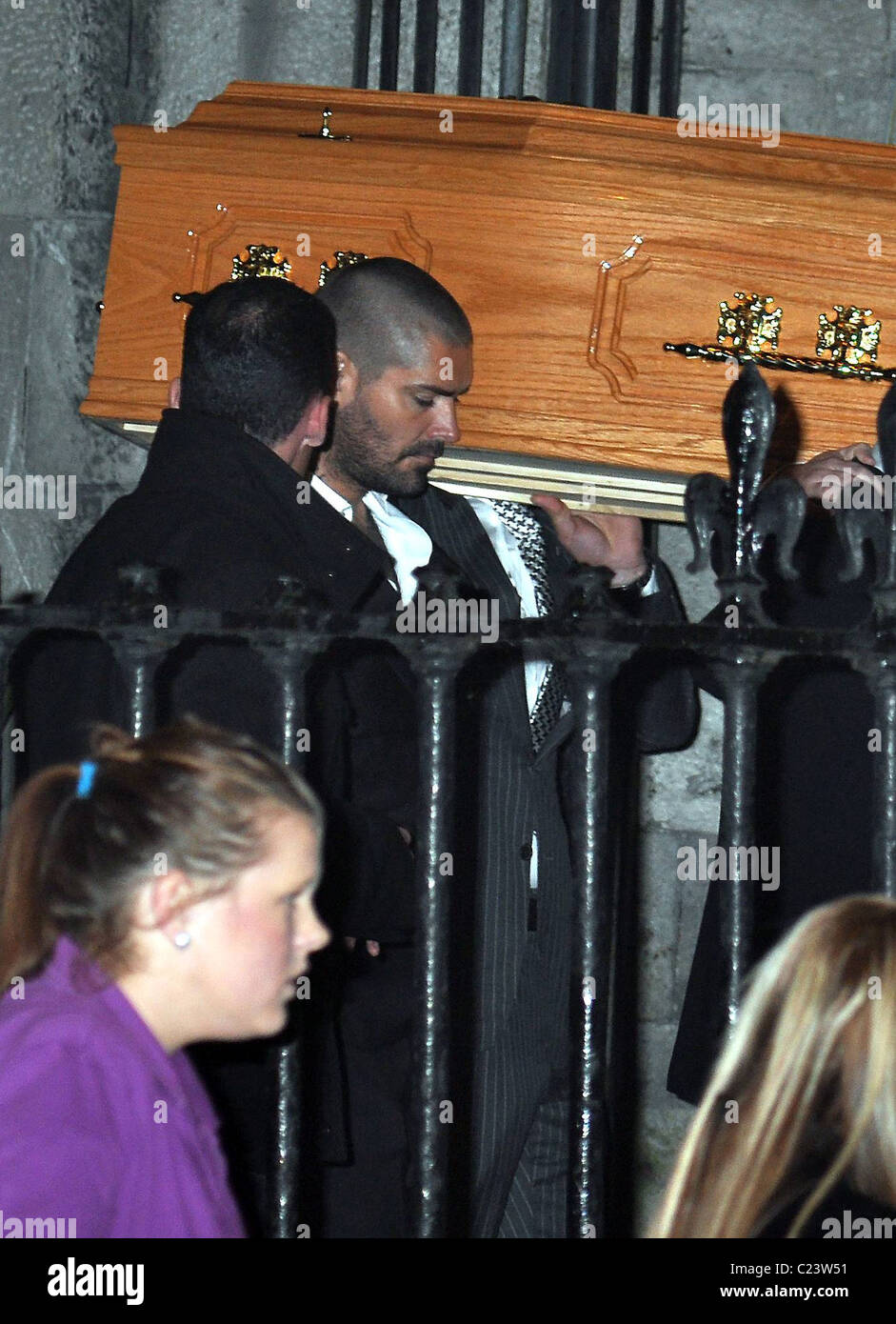 Shane Lynch carries Stephen Gately's coffin from the Jennings funeral ...