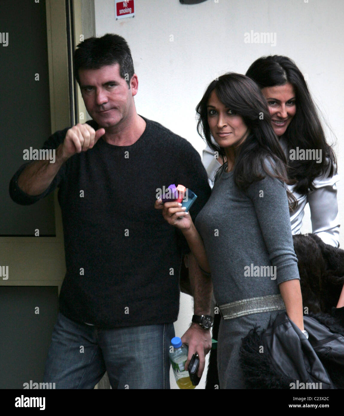 Cheryl Cole And Simon Cowell Smoking