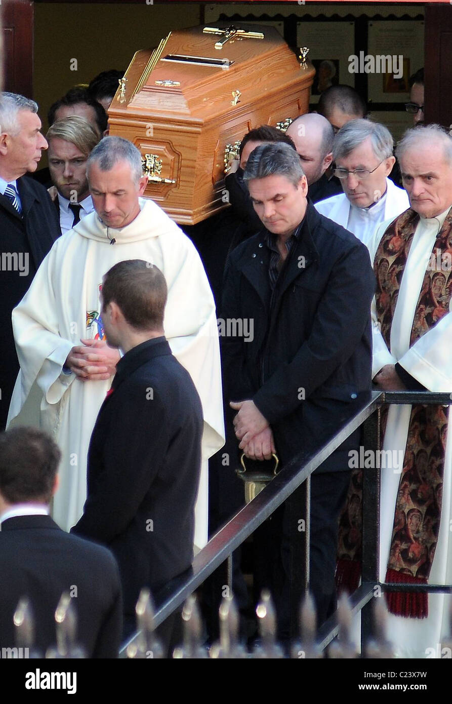 Ronan Keating and his Boyzone band-mates carry the coffin The Requiem ...