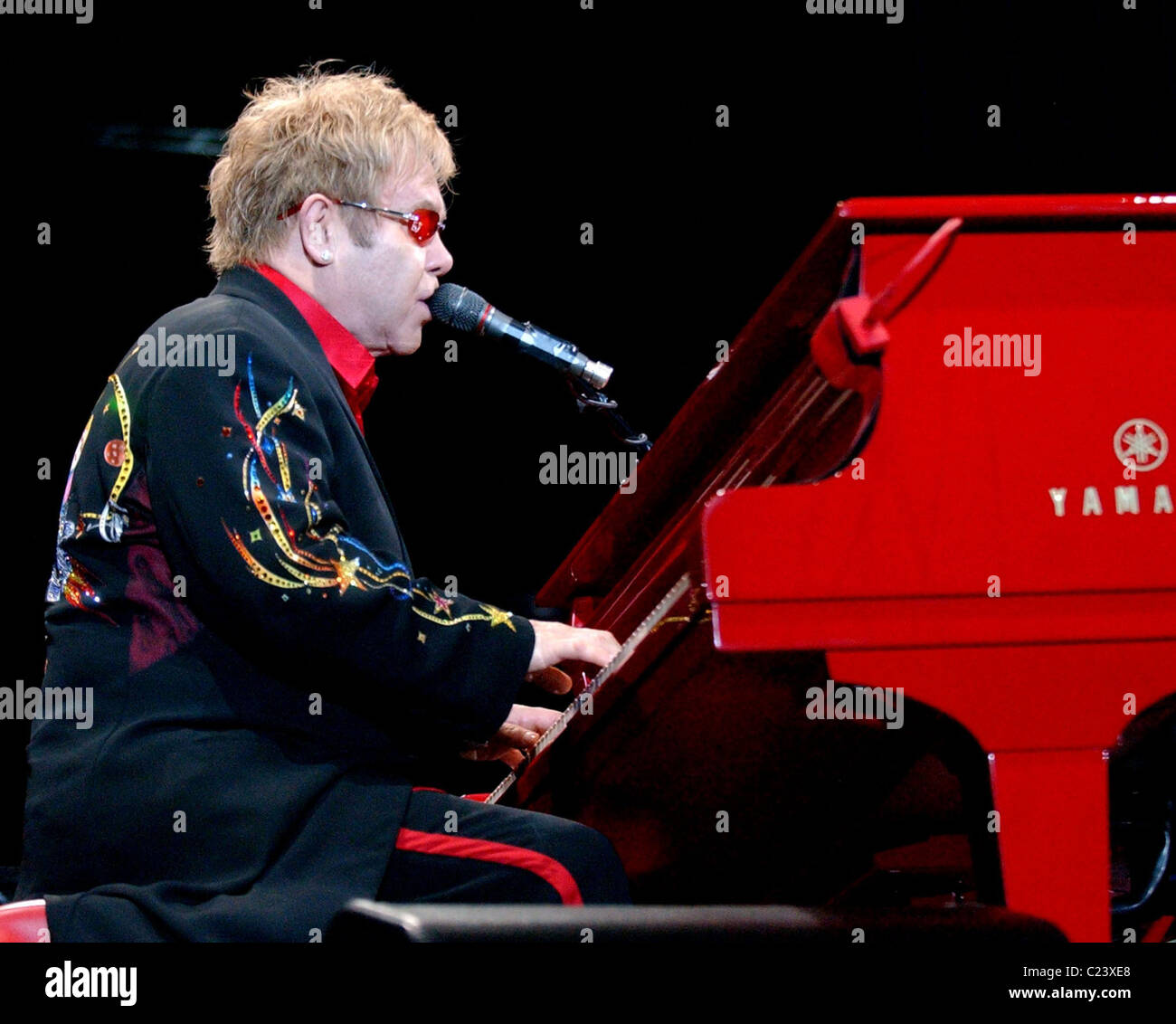 Elton John performing live in concert during his 'Red Piano Tour' at ...