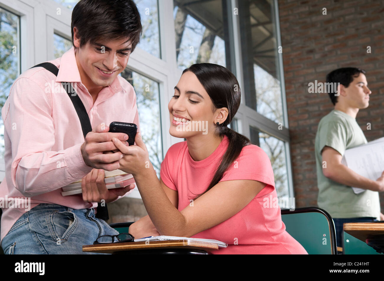 students, holding, a, mobile., cellphone, at, university, campus ...