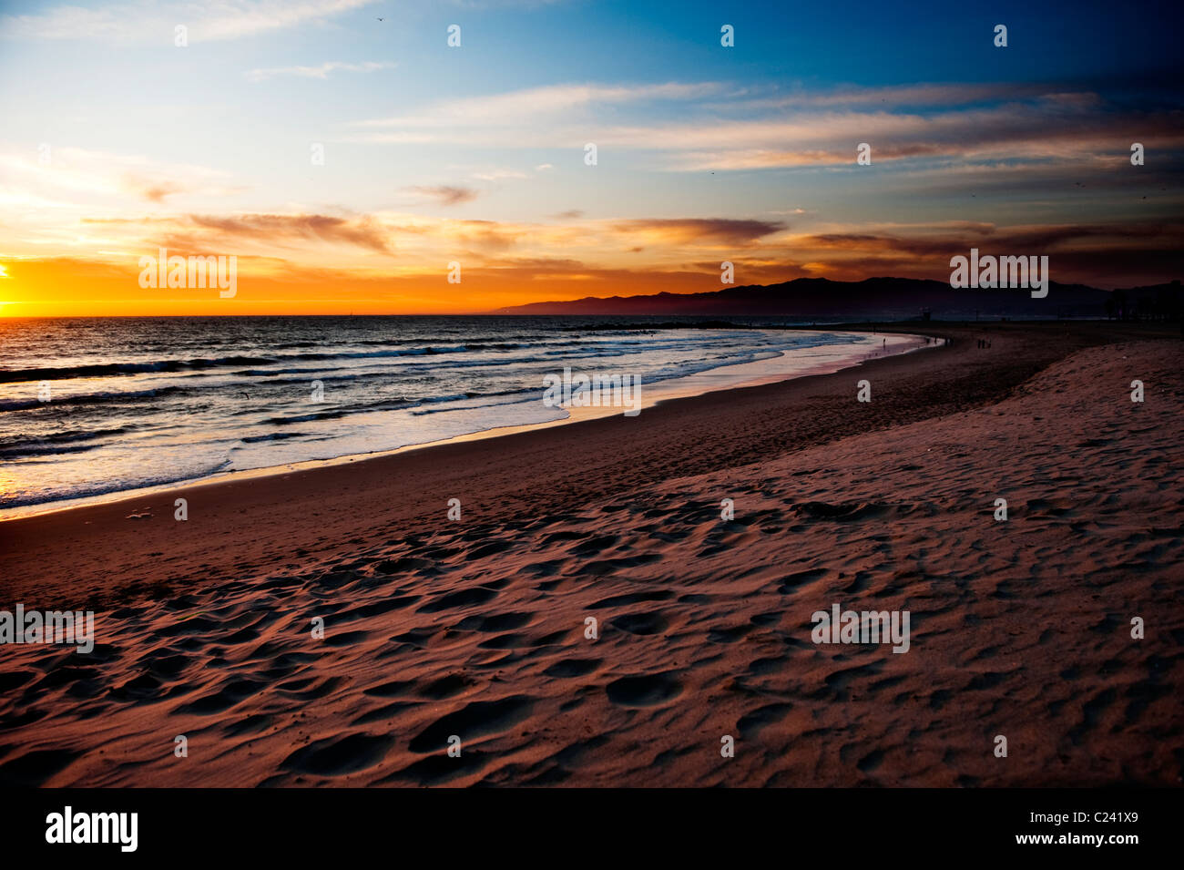 beautiful sunset at the beach Stock Photo - Alamy