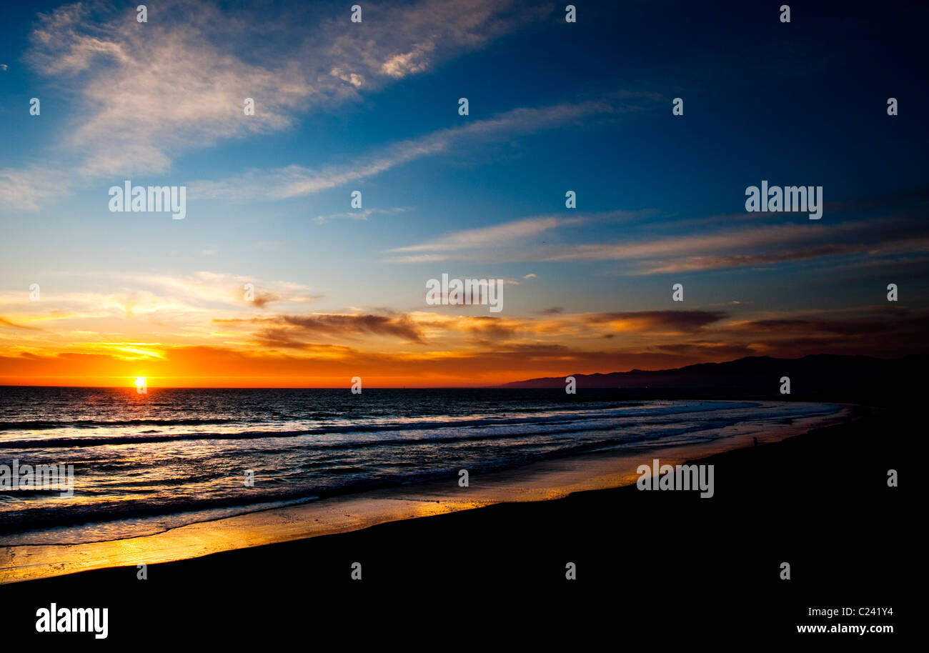 Beautiful sunset at the beach Stock Photo - Alamy
