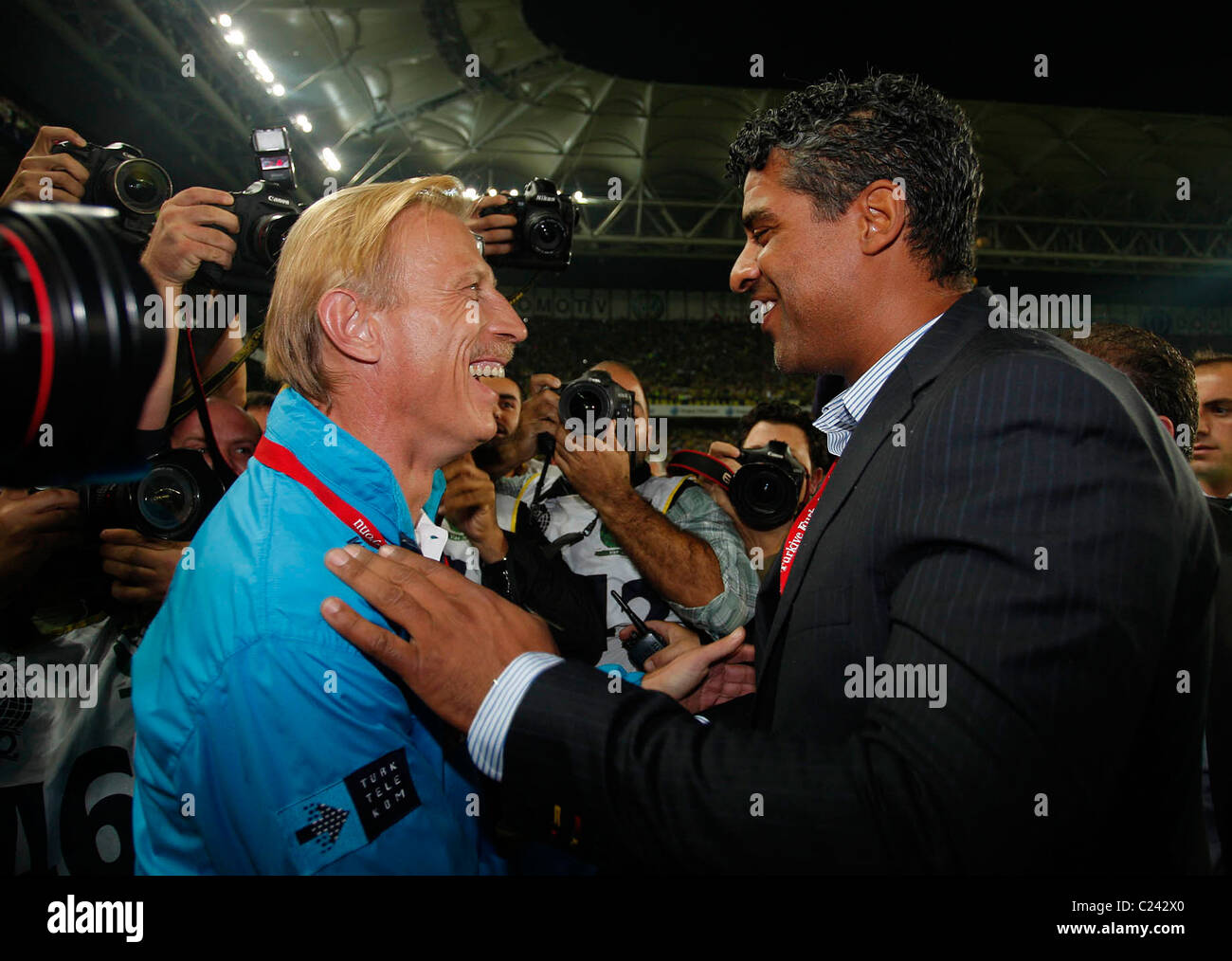 Coach Christoph Daum of Fenerbahce and Coach Frank Rijkaart of ...