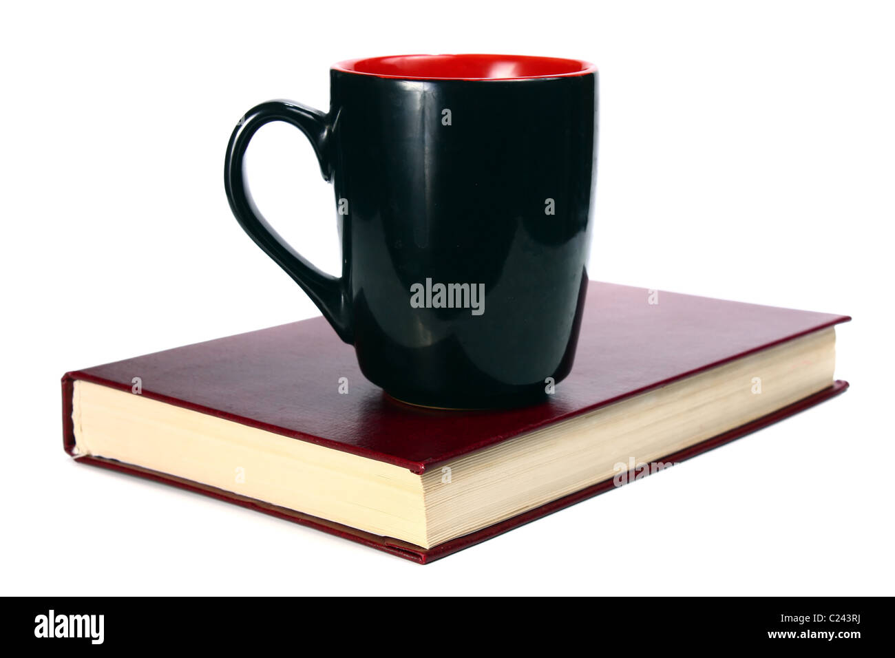 book and cup isolated on white background Stock Photo - Alamy