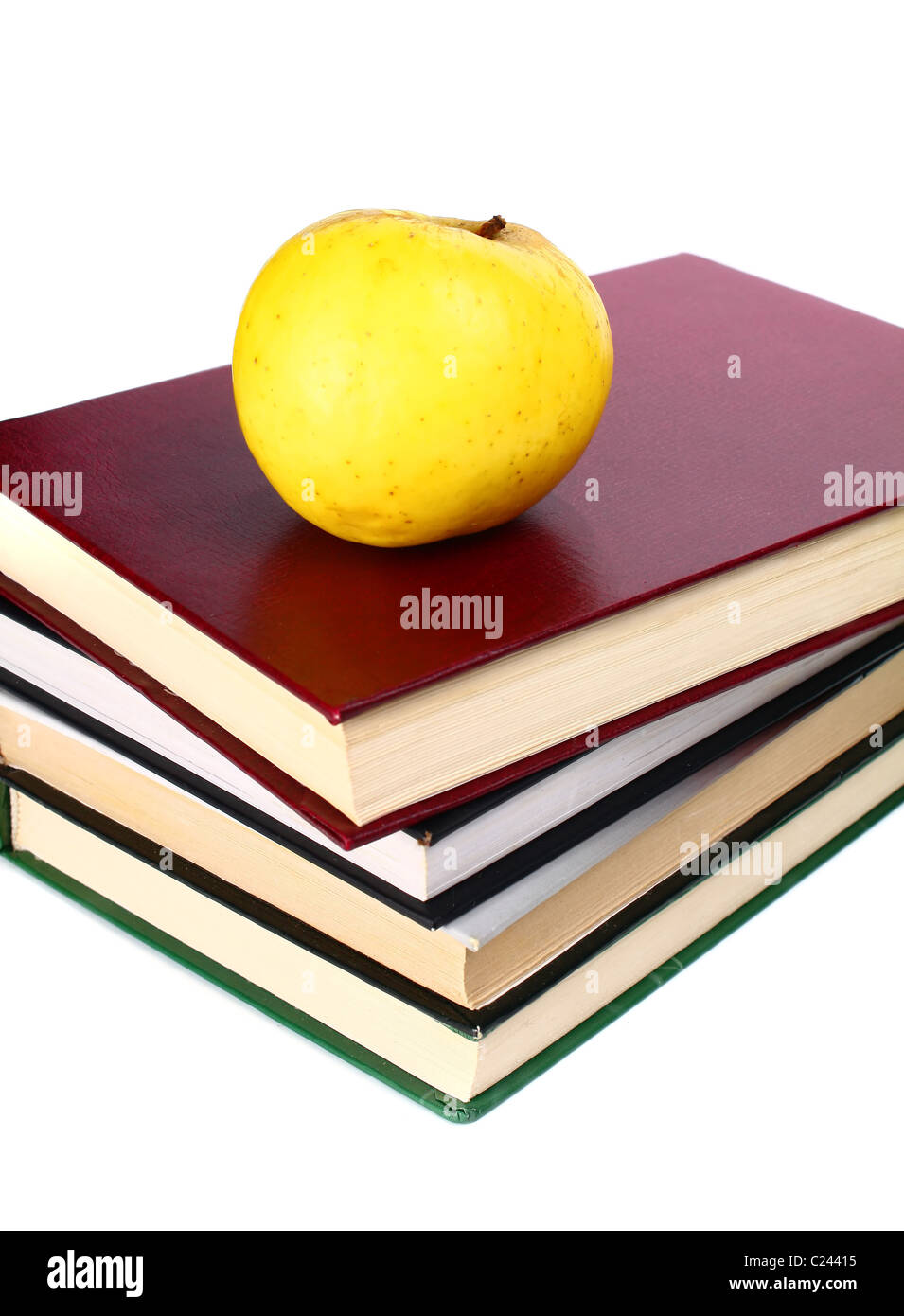 books and apple isolated on white background Stock Photo - Alamy