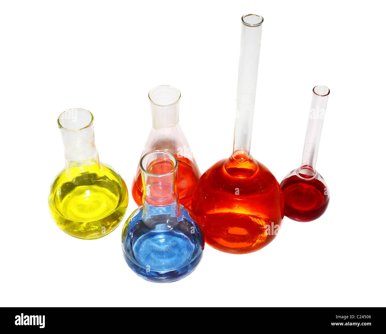 laboratory beakers with the coloured liquid isolated on white ...