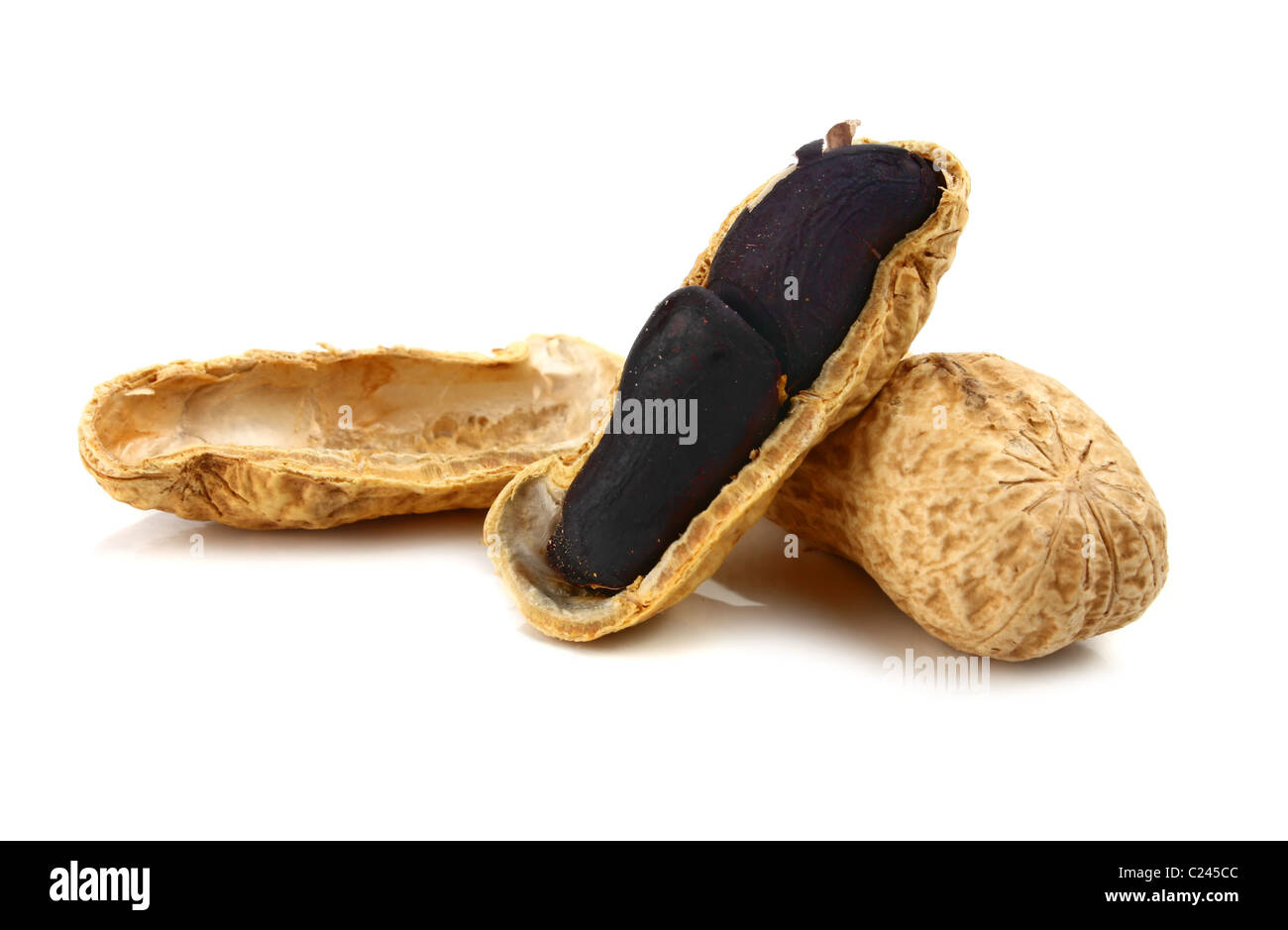 black peanut isolated on white background Stock Photo - Alamy