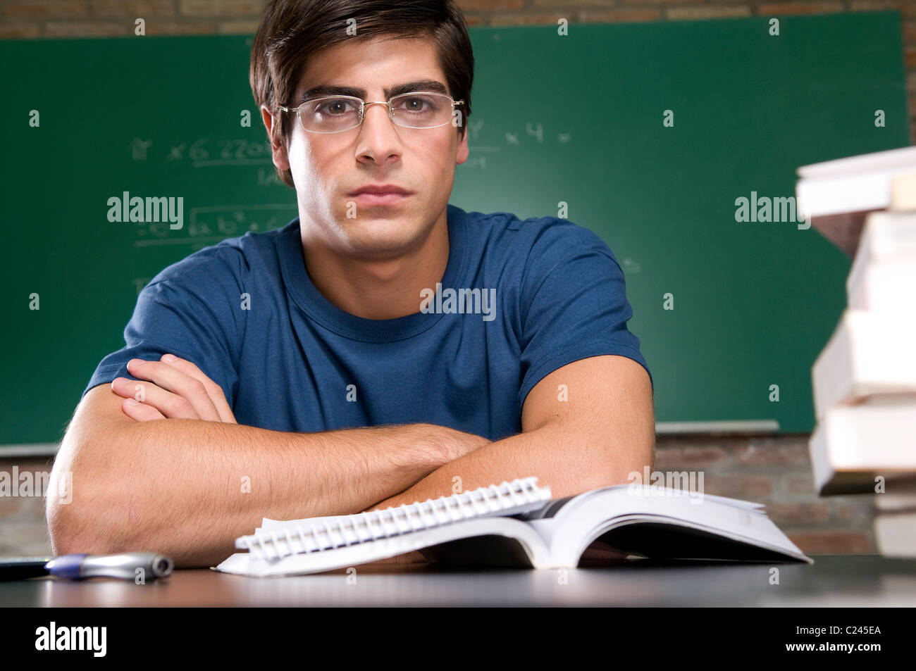 Male university student in classroom Stock Photo - Alamy