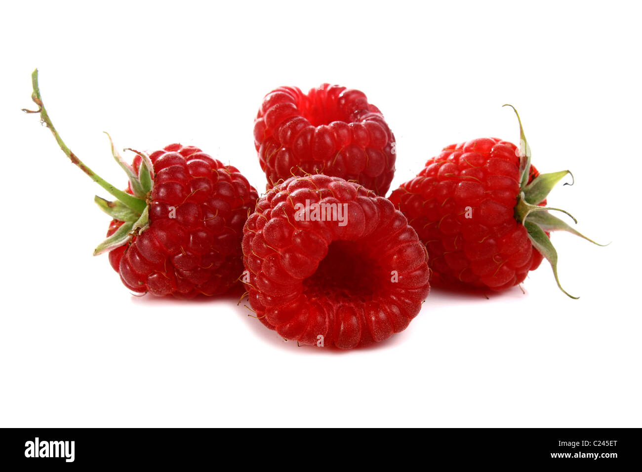 ripe red raspberry isolated on white background Stock Photo - Alamy