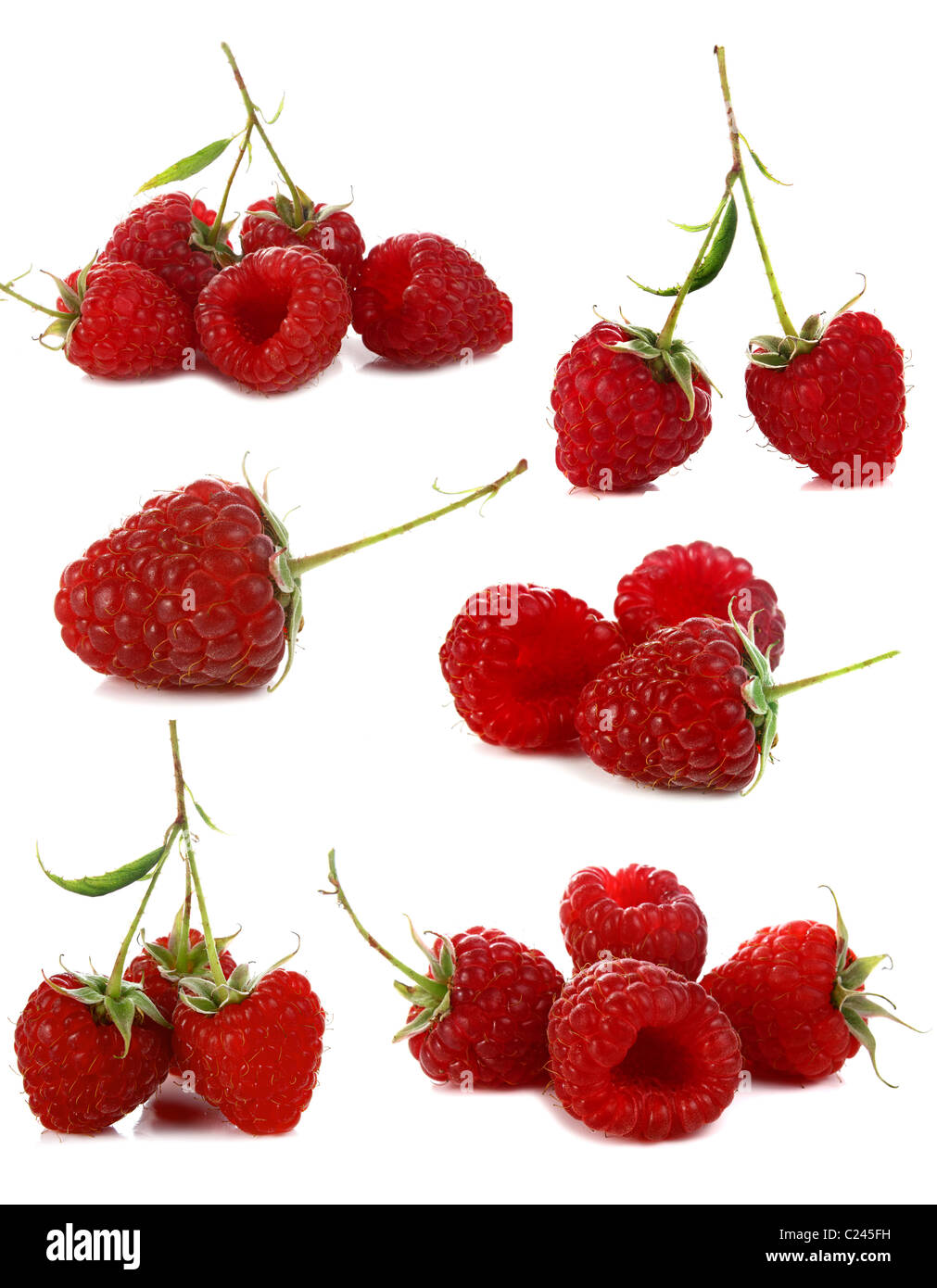 ripe red raspberry isolated on white background Stock Photo - Alamy