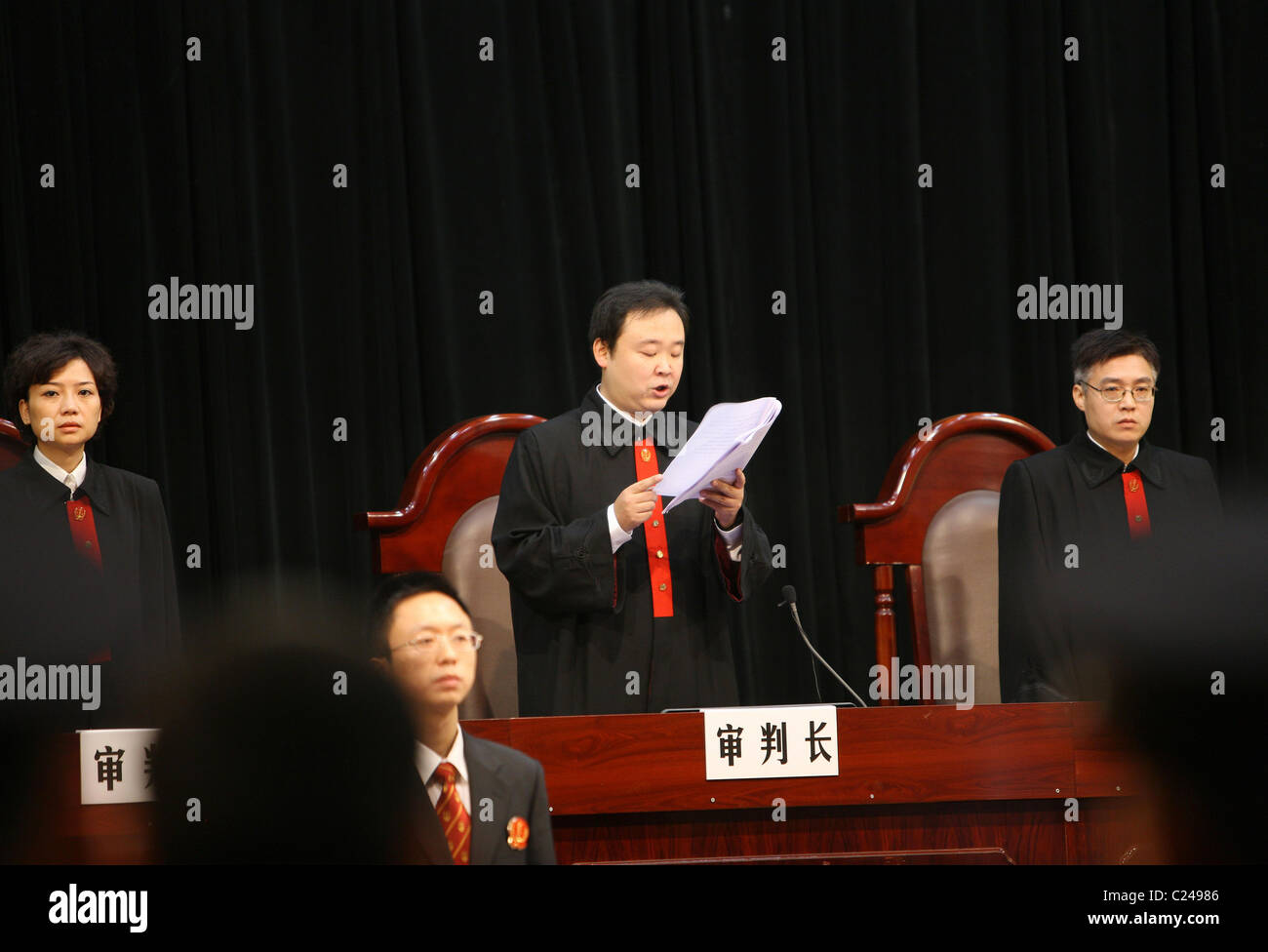 Chief justice announces the sentences of Xie Caiping and her ...