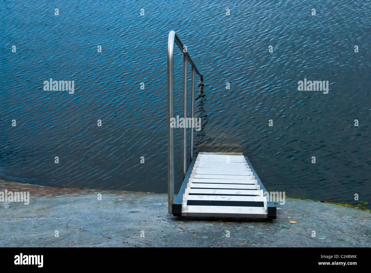 Steps into the water Stock Photo - Alamy