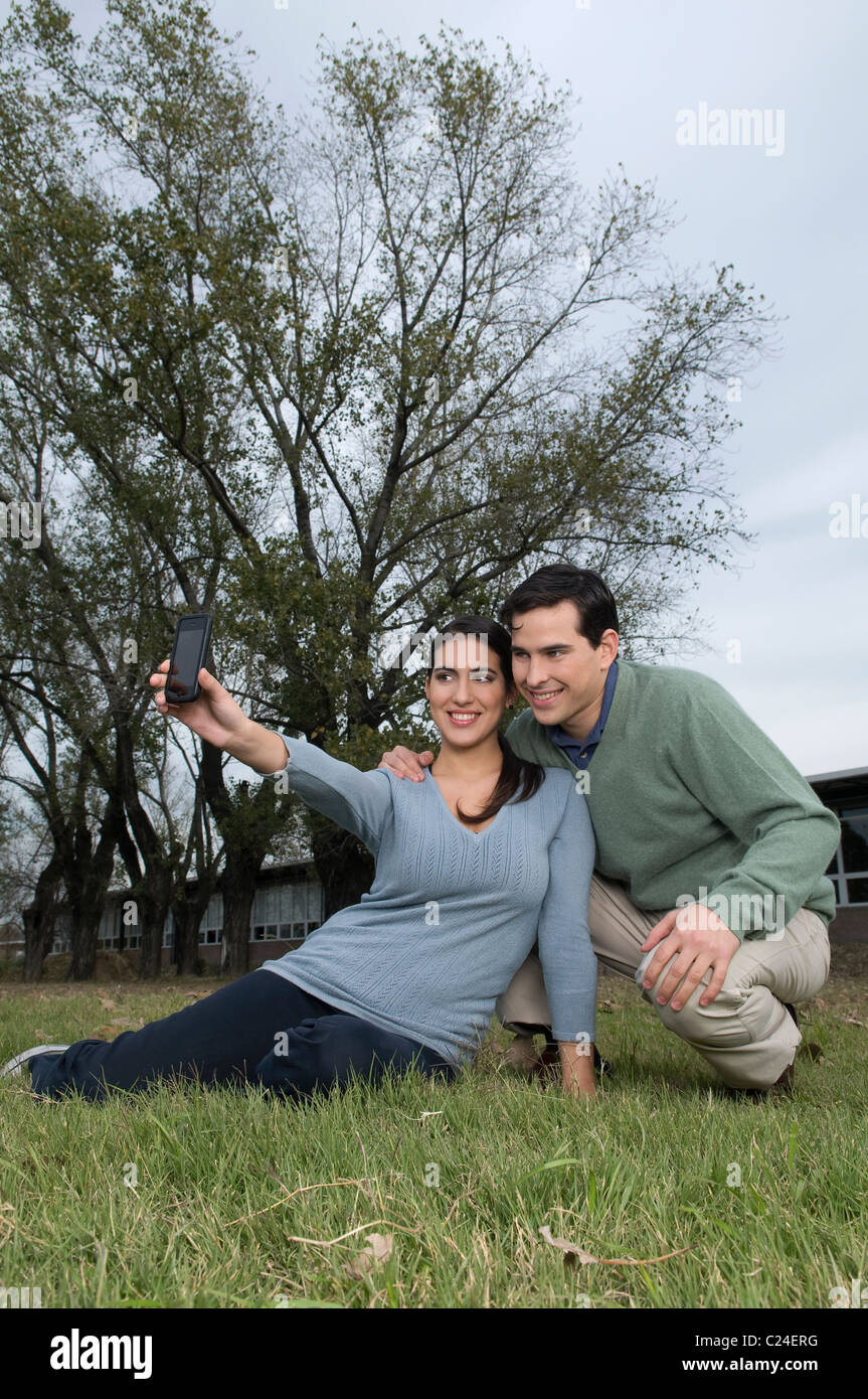 University students taking photo on campus Stock Photo - Alamy