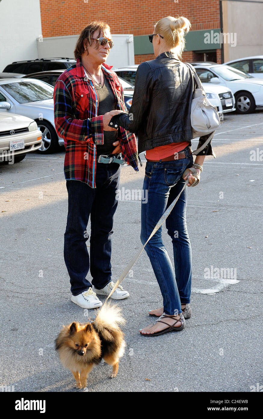 Mickey Rourke shares an intimate moment with a friend Los Angeles ...