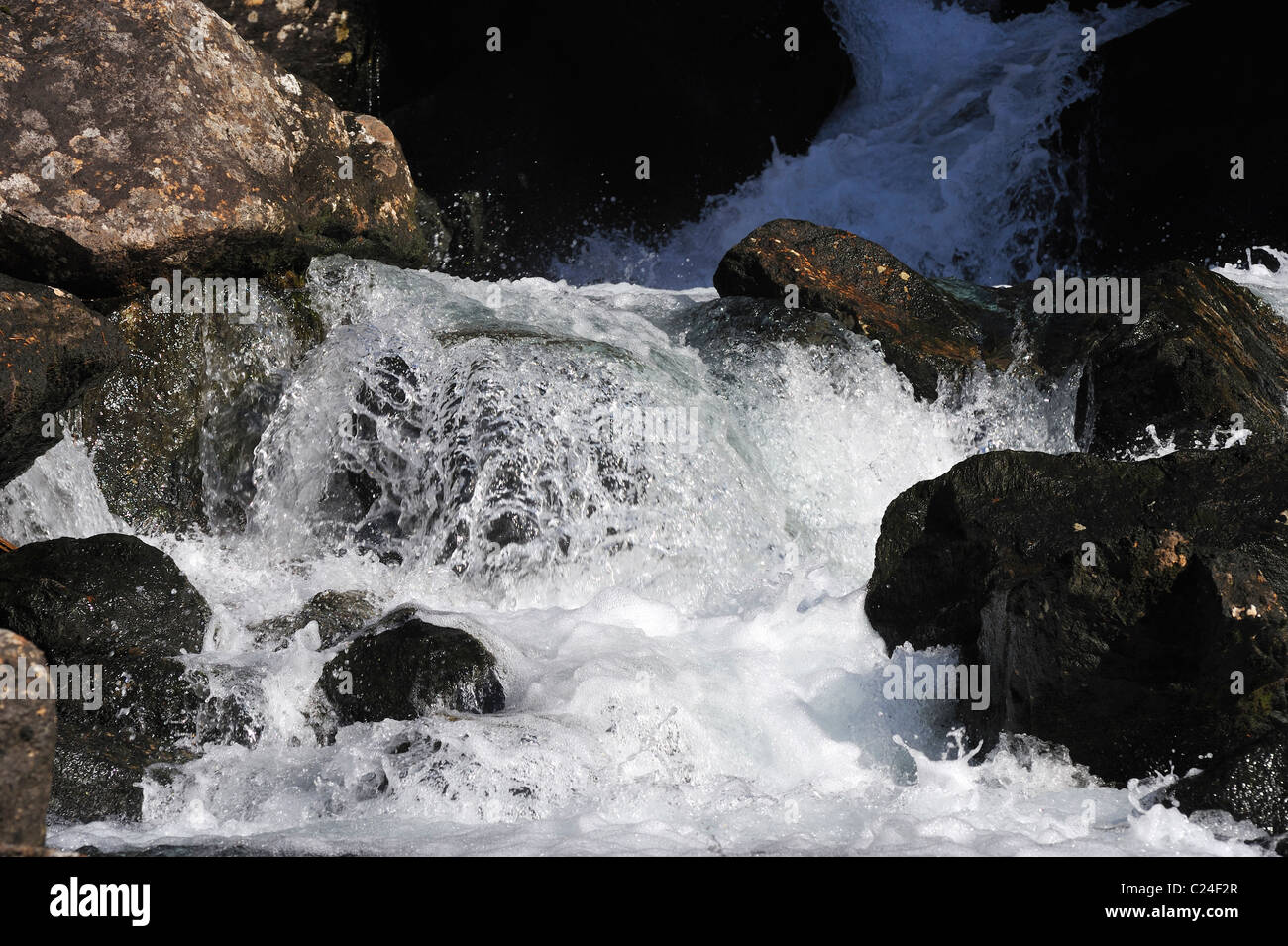 Stream between rocks, Roldal Norway Stock Photo - Alamy