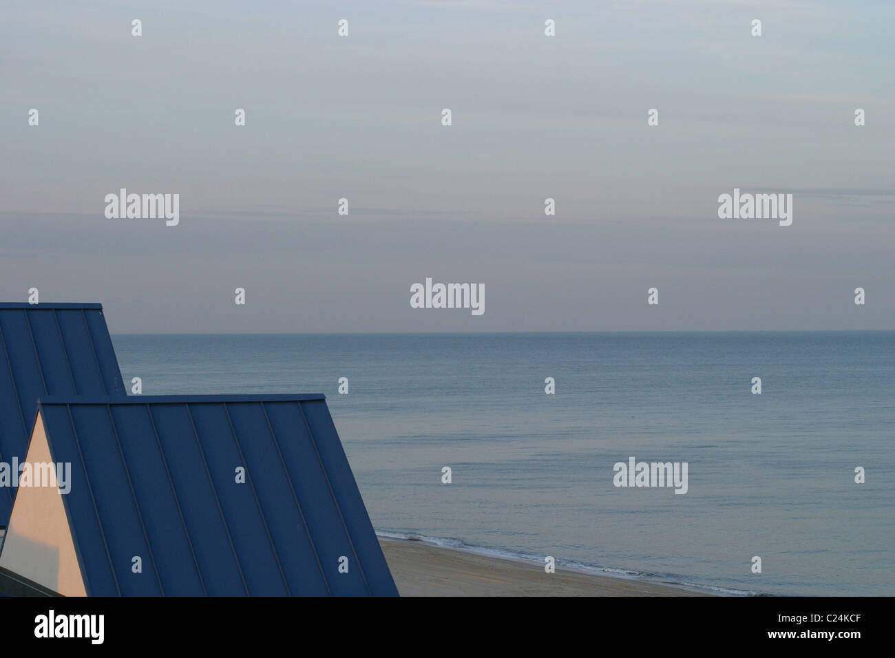 Abstract blue rooftops in front of the ocean Stock Photo - Alamy