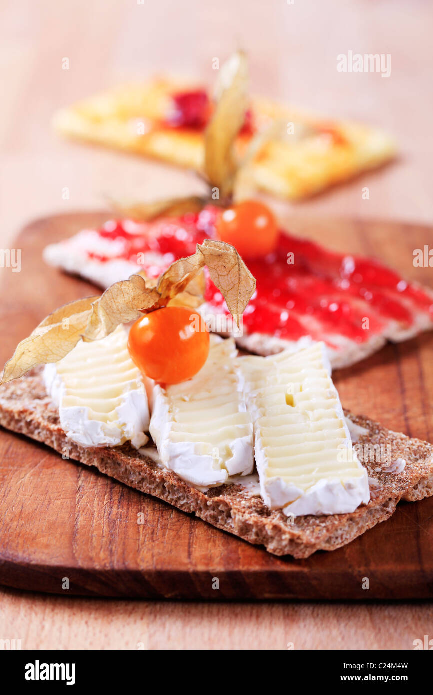 Variety of crackers with cheese and jam Stock Photo - Alamy