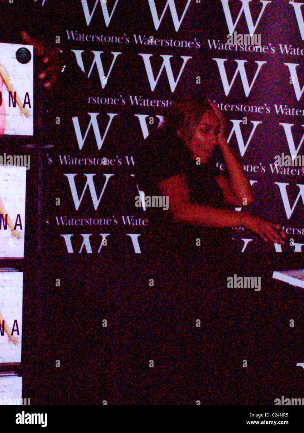 Leona Lewis holds her head after being punched while signing copies of ...