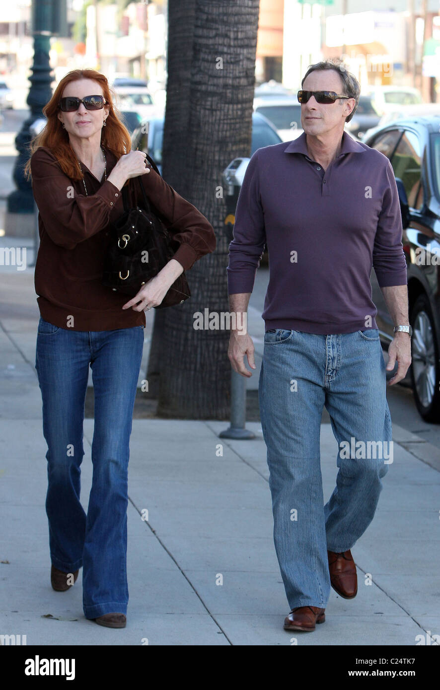 Marcia Cross and husband Tom Mahoney walk back to their car after ...