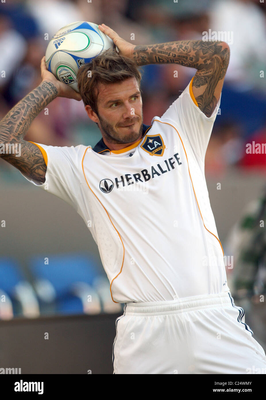 David Beckham making a throw-in for the Los Angeles Galaxy v Chiva USA ...