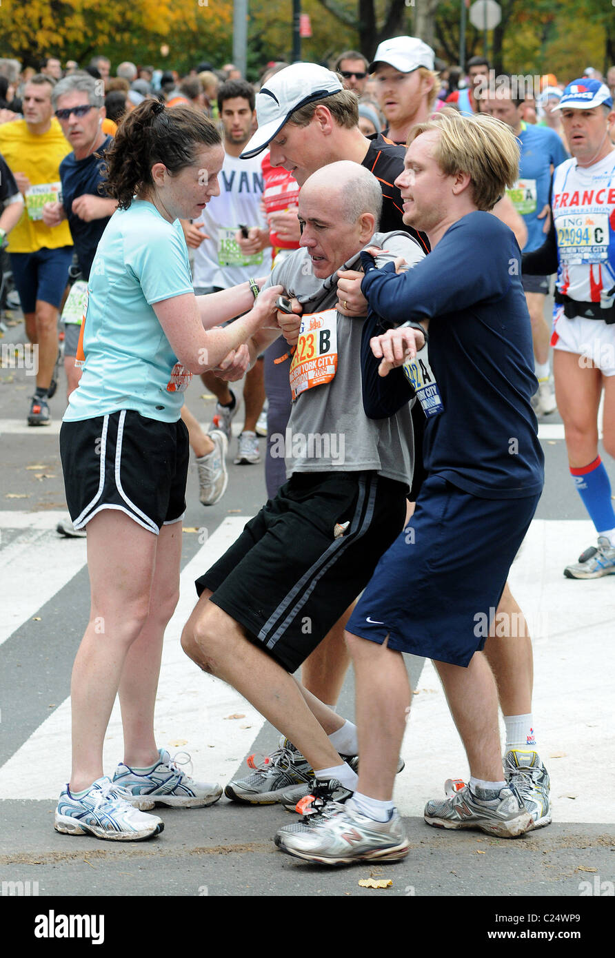 Runner collapses through exhaustion The ING New York City Marathon New ...